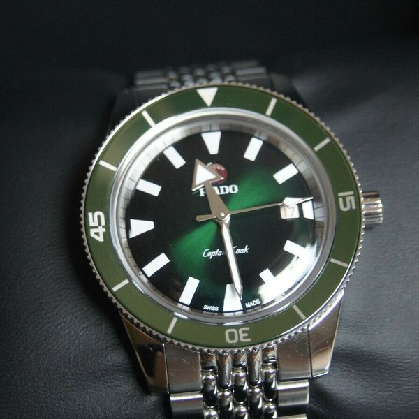 Rado Captain Cook 42mm green with beads of rice bracelet | WatchCharts ...