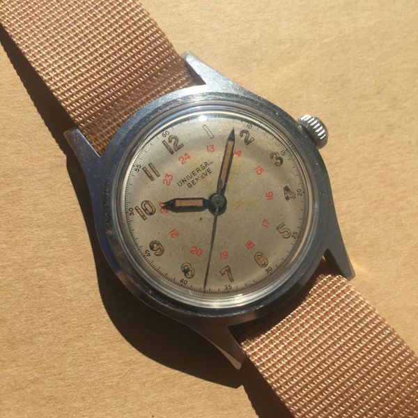 SOLD 1940's Universal Genève with 24 hour radium dial and step case ...