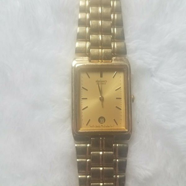 Vintage Seiko V722-5A50 Gold Tone Gold Dial Mens Quartz Analog Watch w/ Date | WatchCharts ...