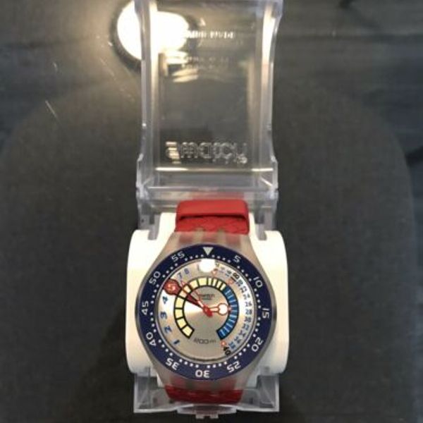 Brand new Swatch Fun Scuba model SUGK102 Red Scale Tuna | WatchCharts