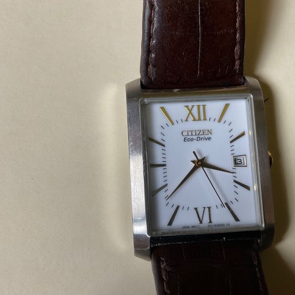 Citizen Eco-Drive square menâ s watch with brown leather band. White ...