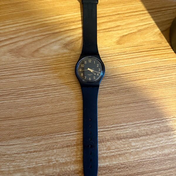 Swatch Small Black Watch Battery needs replacing | WatchCharts Marketplace