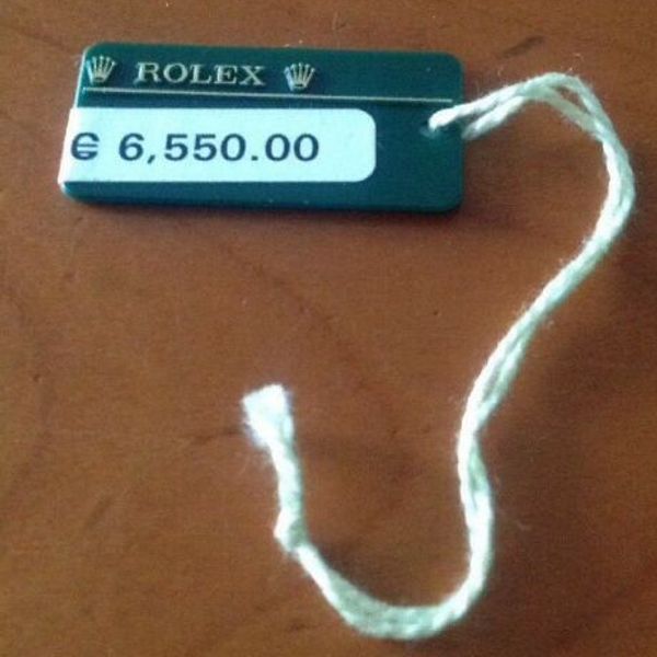 Rolex Green Tag Price, barcode and w70461 model | WatchCharts Marketplace
