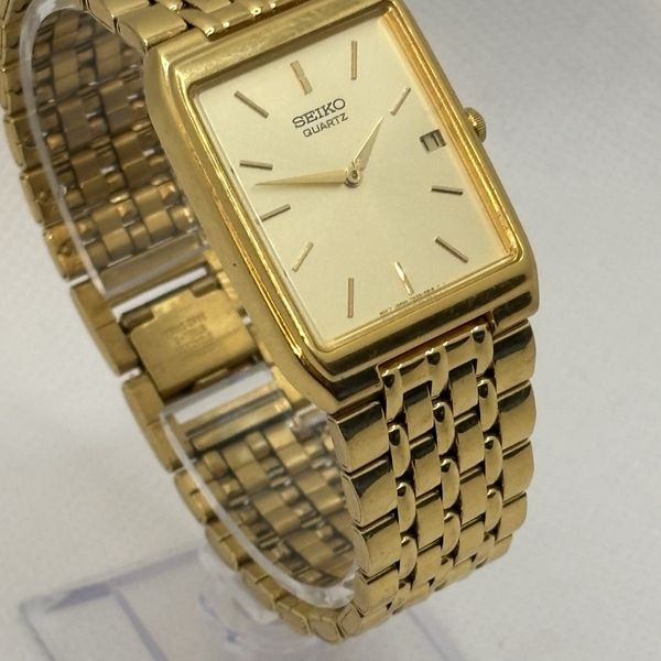 Vintage Seiko 7N29-5B29 Gold Tone Rectangular Mens Quartz Watch | WatchCharts Marketplace