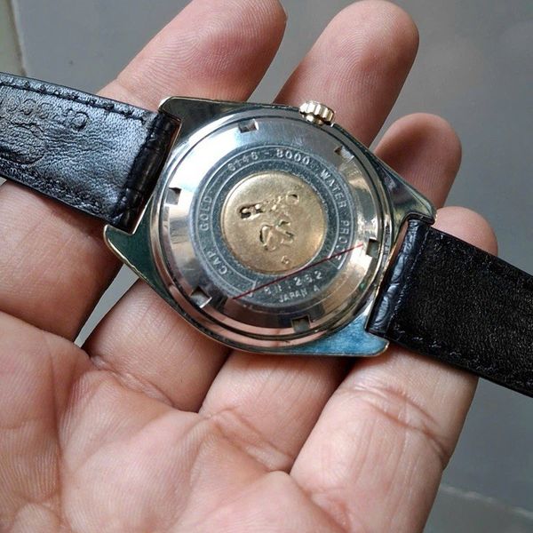 Grand Seiko GS 6146-8000, Cap Gold, Automatic | WatchCharts Marketplace