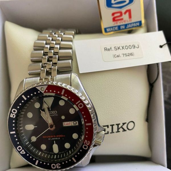 Seiko SKX009J1 Automatic Mens Divers Watch, New, Bracelet | WatchCharts