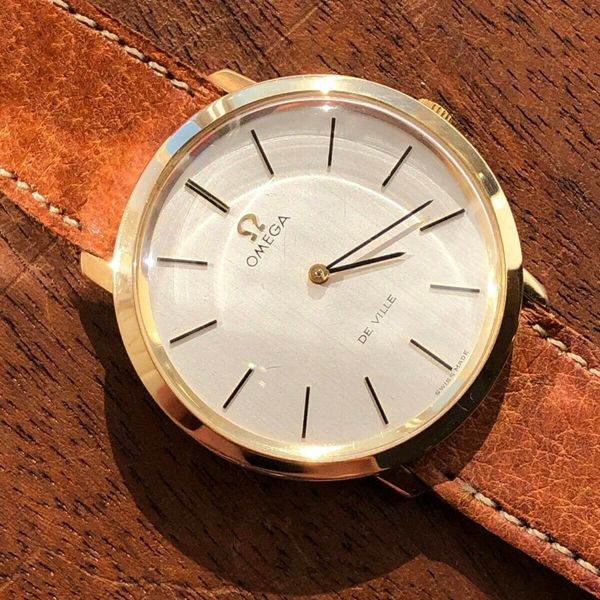 Omega DeVille 9k solid gold caliber 625, textured dial, in almost NOS condition | WatchCharts ...