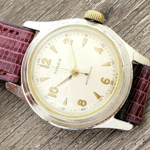 QB8: VINTAGE MENS TIMEX HAND WIND MARLIN RAISED GOLD #s VINTAGE ...