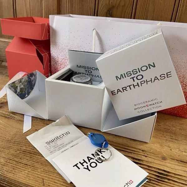 swatch x omega mission to earthphase ORIGINALE | WatchCharts Marketplace