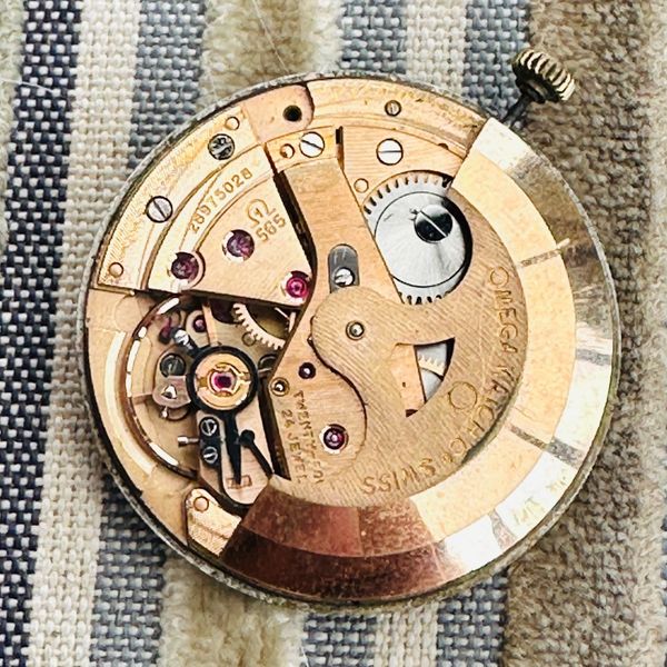 Vintage Omega caliber 565 movement, dial, hands, stem and crown. Runs ...