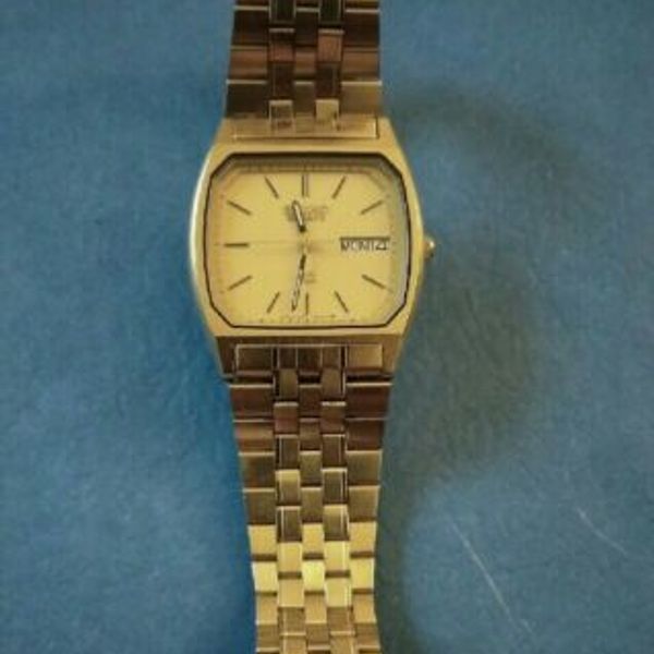 Vintage Men's Watch SEIKO SQ quartz Day Date 8123-5209 gold tone (As-Is) | WatchCharts Marketplace