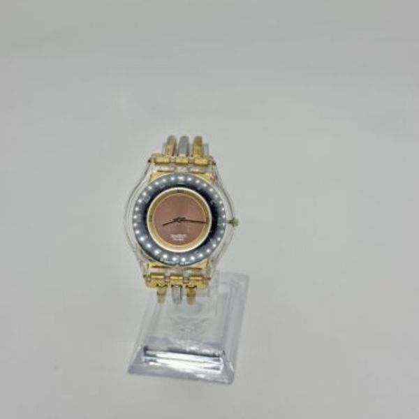 Swatch Skin TRI-GOLD SFK240B Women's Watch New Battery | WatchCharts ...