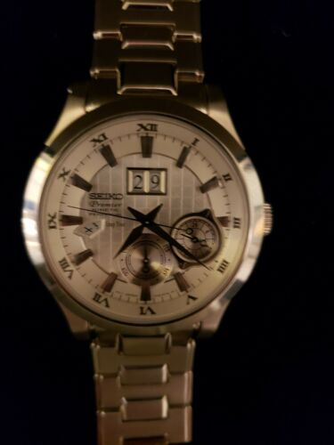 Seiko Men's Premier Kinetic Perpetual Calendar Silver Dial Dress Watch SNP001 | WatchCharts ...