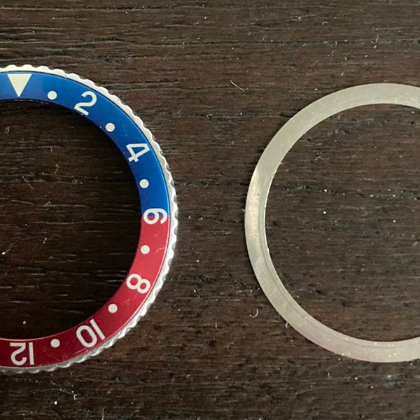 1675 bezel assembly (red back) | WatchCharts Marketplace