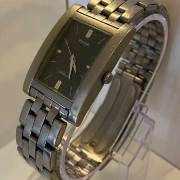 Pulsar watch titanium v701-5260 quartz watch slight marks on glass ...