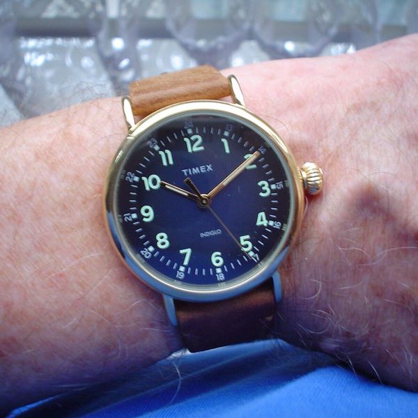 Timex Standard Watch. Black dial gold tone hands. Gold tone case ...