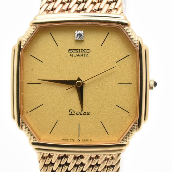 Vintage [NEAR MIINT] SEIKO Dolce 7731-5000 Gold Diamond Men's Quartz Watch JAPAN | WatchCharts ...