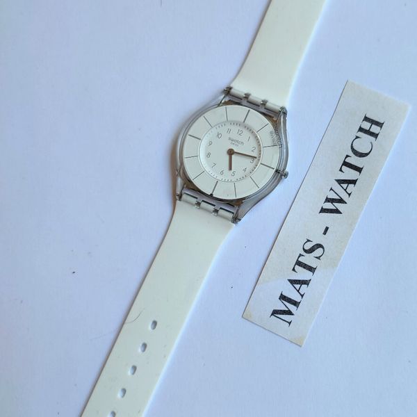 SWATCH+SKIN+SFK360 BIANCO CLASSE+NUOVO/NUOVO | WatchCharts Marketplace