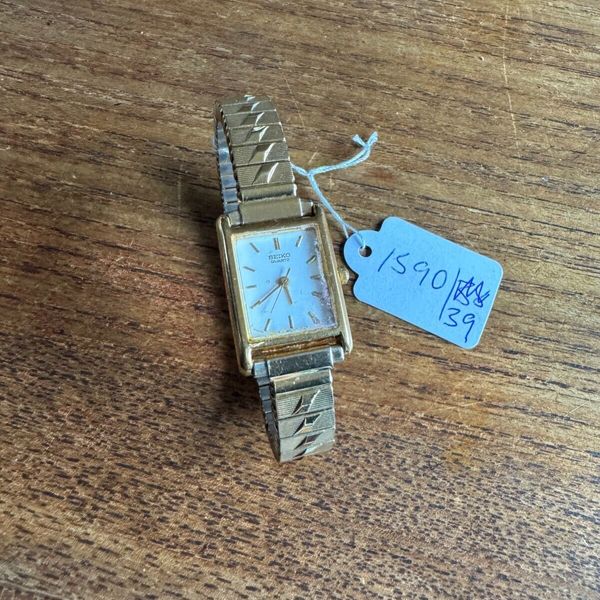 Ladies SEIKO Rectangular Gold Coloured Watch W1590/39 | WatchCharts ...