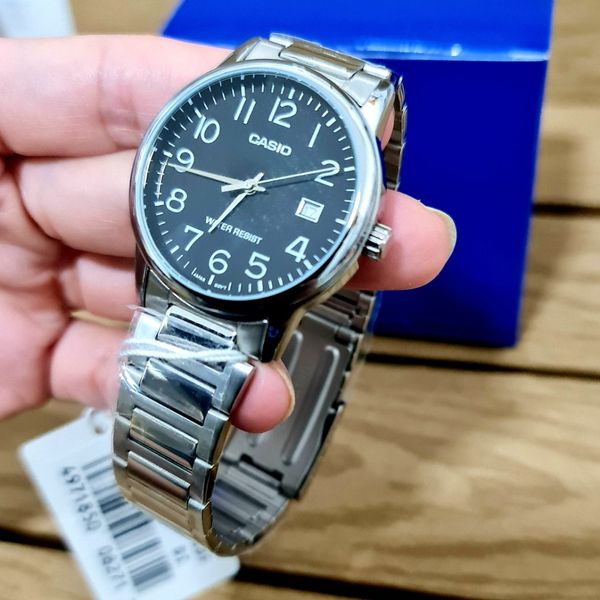 Casio men's stainless steel analog quartz numbering watch | WatchCharts Marketplace