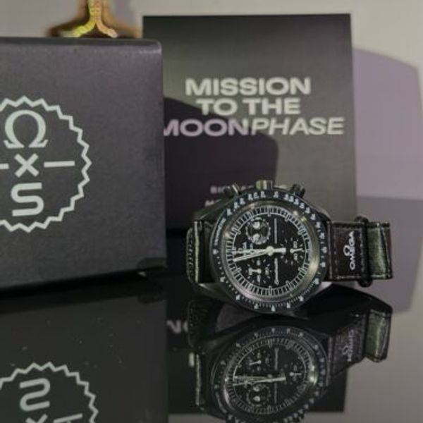 swatch x omega Moon phase Snoopy | WatchCharts Marketplace
