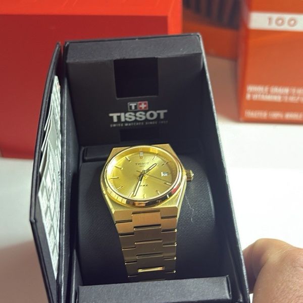 Tissot PRX T137.210.33.021 GOLD 35mm | WatchCharts Marketplace