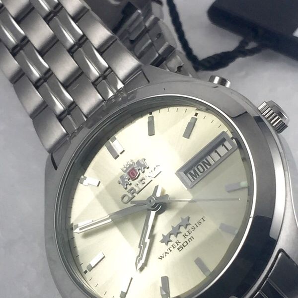 New Reloj Orient Men's Faceted Crystal Gold Dial Automatic Silver Watch ...