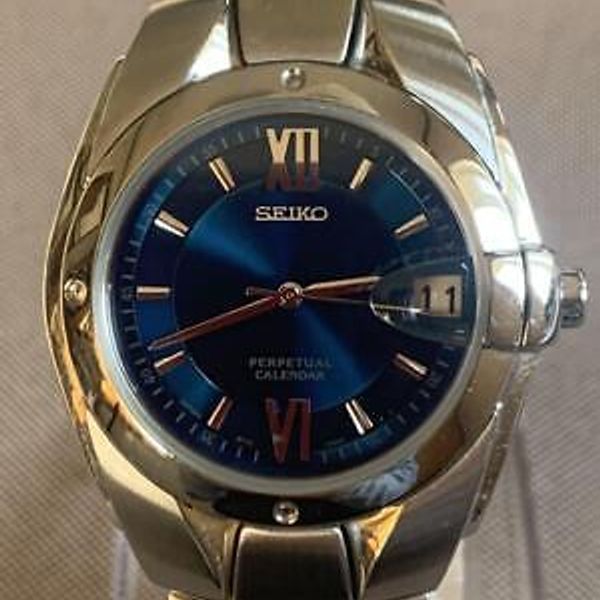 SEIKO Perpetual Calendar 8F32-005A Quartz Blue Dial Date Men's Watch | WatchCharts Marketplace