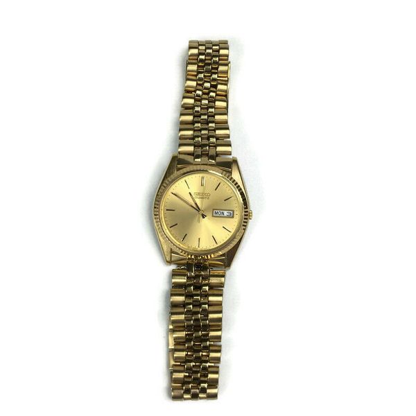 VINTAGE MENS 1998 SEIKO QUARTZ WATCH 7N43-8111 DAY/DATE GOLD TONE JAPAN | WatchCharts Marketplace