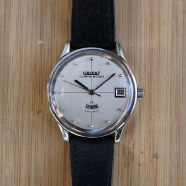 Orient Olympia Calendar Swimmer 0-19635 JDM Wristwatch | WatchCharts ...