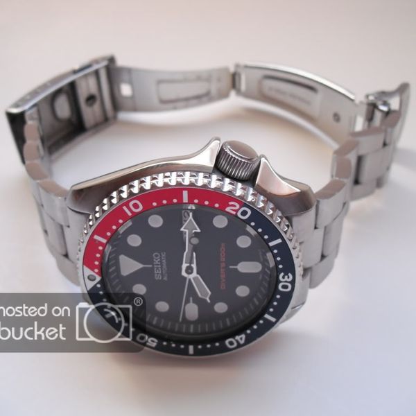 Seiko SKX009 with Bracelet + Strap | WatchCharts Marketplace