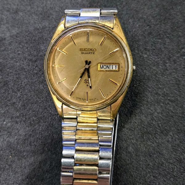 Vintage Seiko SQ 8223-8019 Two Tone Wrist Watch Japan Date Day | WatchCharts Marketplace
