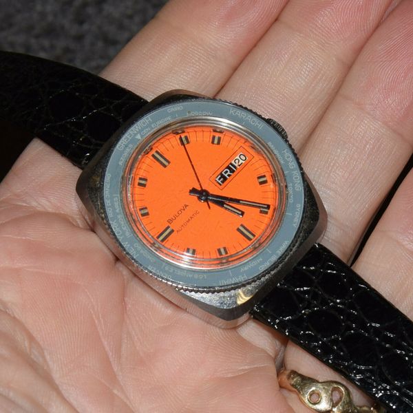 VINTAGE MENS BULOVA M9 AUTOMATIC DAY DATE WORLD TIME WATCH ORANGE DIAL ...