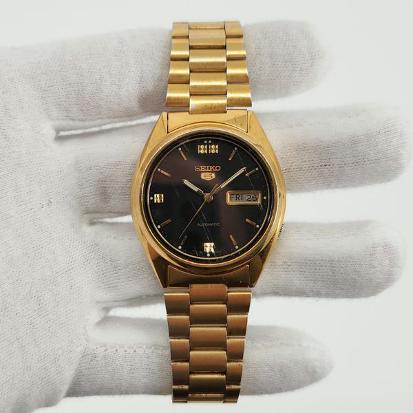 Seiko 5 Men's Vintage Day-Date Gold Tone w/ Black Dial Automatic Watch 7009-3040 | WatchCharts ...