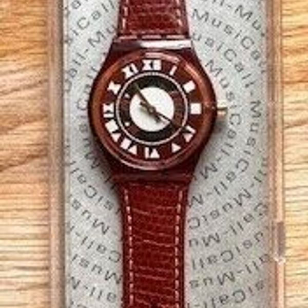 Swatch Watch Musical 1994 Model Brown Piano SLF100 New, boxed and unworn | WatchCharts Marketplace