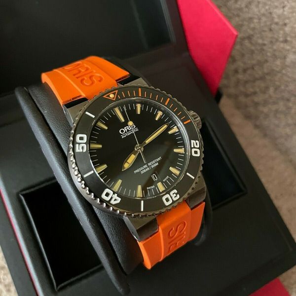 Oris Aquis date black orange diver watch | WatchCharts