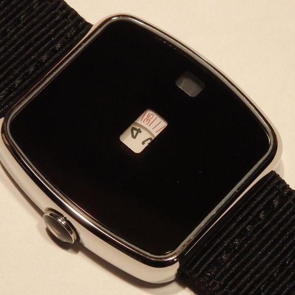 Nixon The Iris "Eye of the storm" quartz watch in black/stainless ...