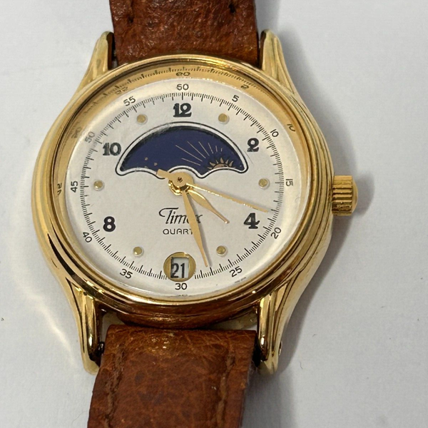 Working Vintage Ladies Gold Timex Watch with Date & Day/Night Indicator ...