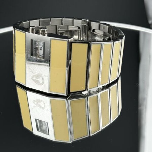 Vintage retro Nixon The Rotolog White cream color Watch | WatchCharts ...