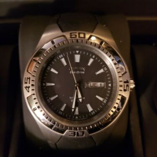 Citizen Eco Drive Titanium Watch E101-K004438 | WatchCharts Marketplace