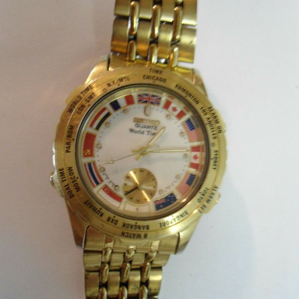 SEIKO QUARTZ WORLD TIMER Gold Tone Watch 8V22-7009 | WatchCharts ...