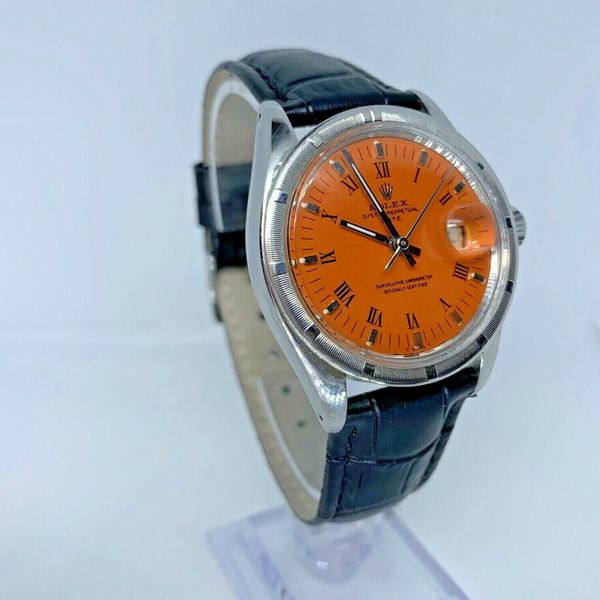 Rolex Oyster Perpetual Rare Orange Dial | WatchCharts Marketplace