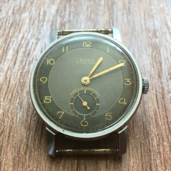 Military Watch DOXA Le Locle Suisse Anti Magnetique RARE | WatchCharts ...