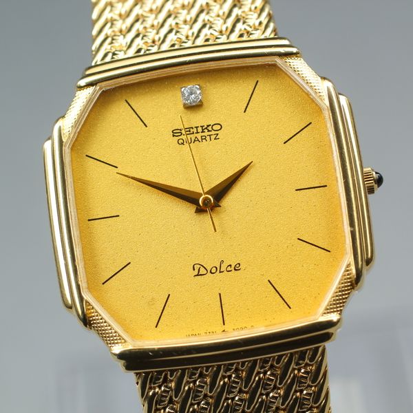 Vintage 1983 [Near MINT] Seiko Dolce 7731-5000 Diamond 29mm Quartz Gold Men's | WatchCharts ...
