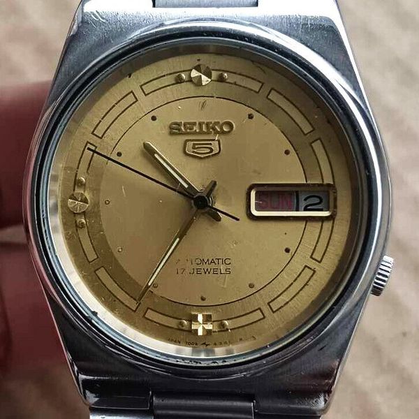 Vintage Seiko 5 automatic 17 jewels Gold dial day date Cal 7009 | WatchCharts Marketplace