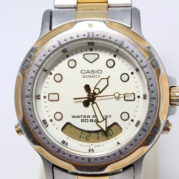 CASIO AD-702 Digital analog Gold silver watch | WatchCharts Marketplace