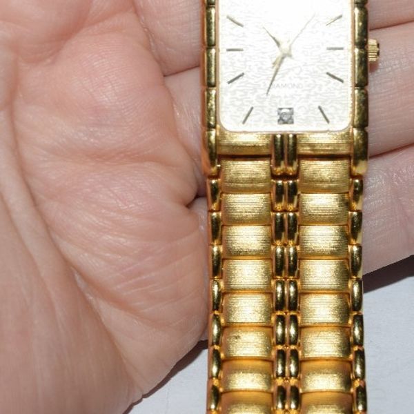 Elgin Diamond Quartz Gold Tone Bracelet Watch Ref: FM846B | WatchCharts ...