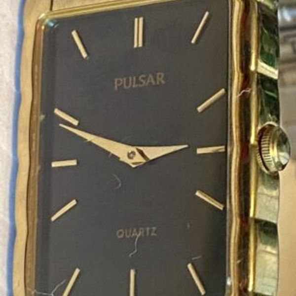 Pulsar Quartz Gold Tone Watch V500 5B00 | WatchCharts Marketplace