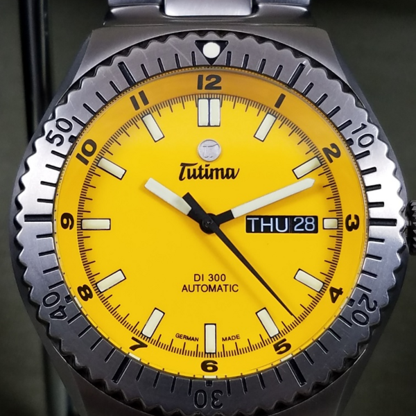 Tutima DI 300-yellow dial + extras | WatchCharts