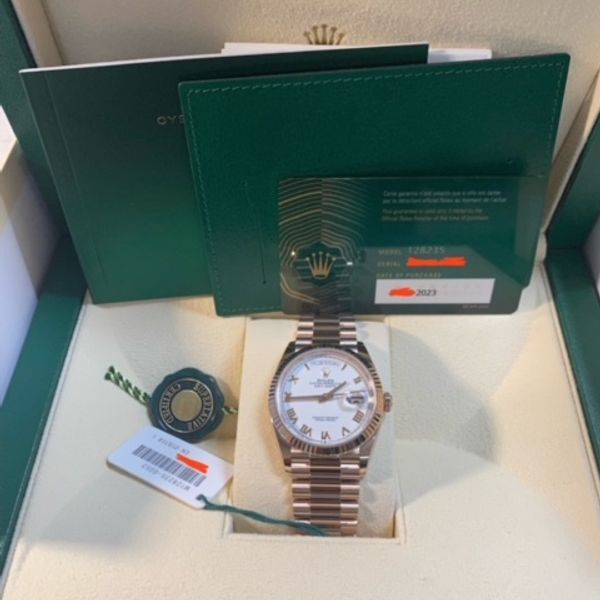 FSOT: 128235 Rolex Daydate White Roman | WatchCharts Marketplace